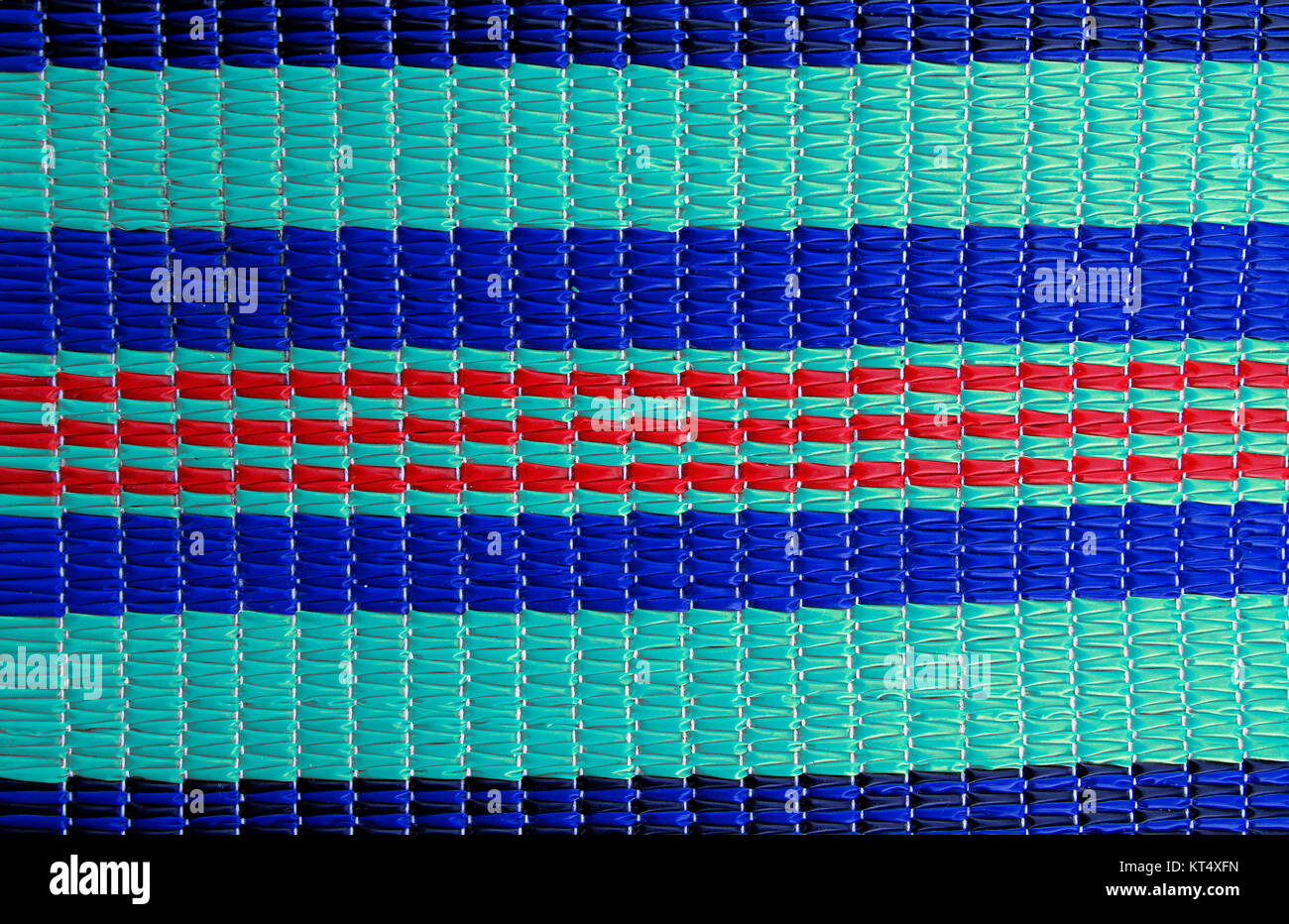 beach rug plastic straight line cyano blue red Stock Photo - Alamy