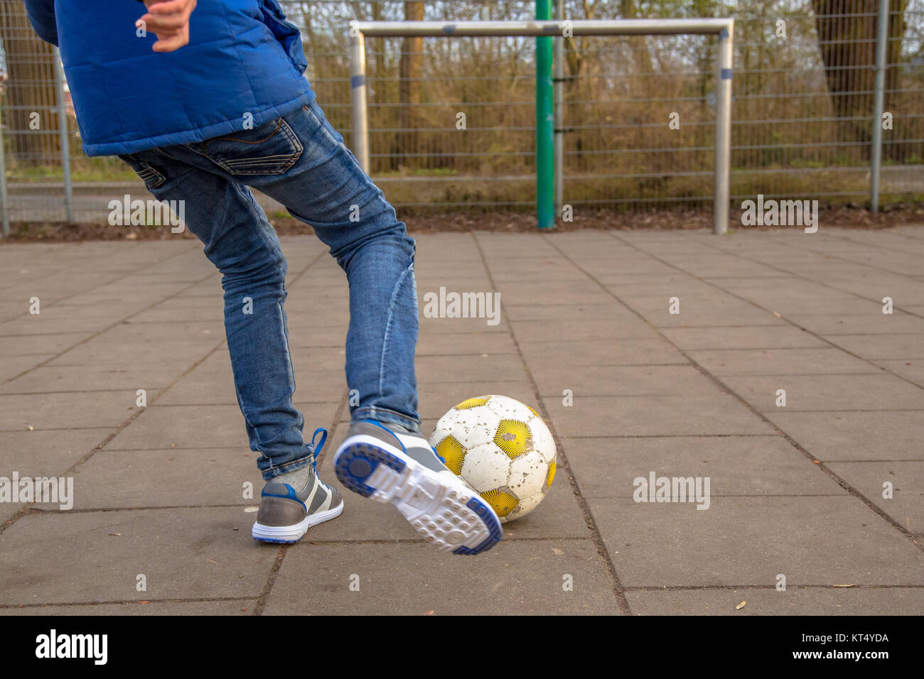 Kicking football hi-res stock photography and images - Alamy