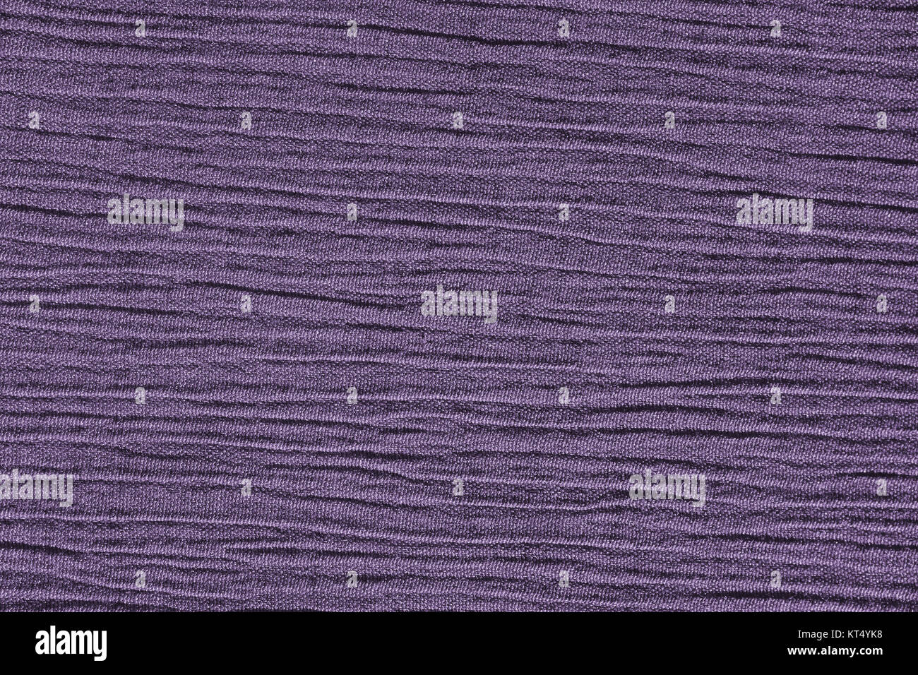 Heather purple crinkled material background texture Stock Photo - Alamy
