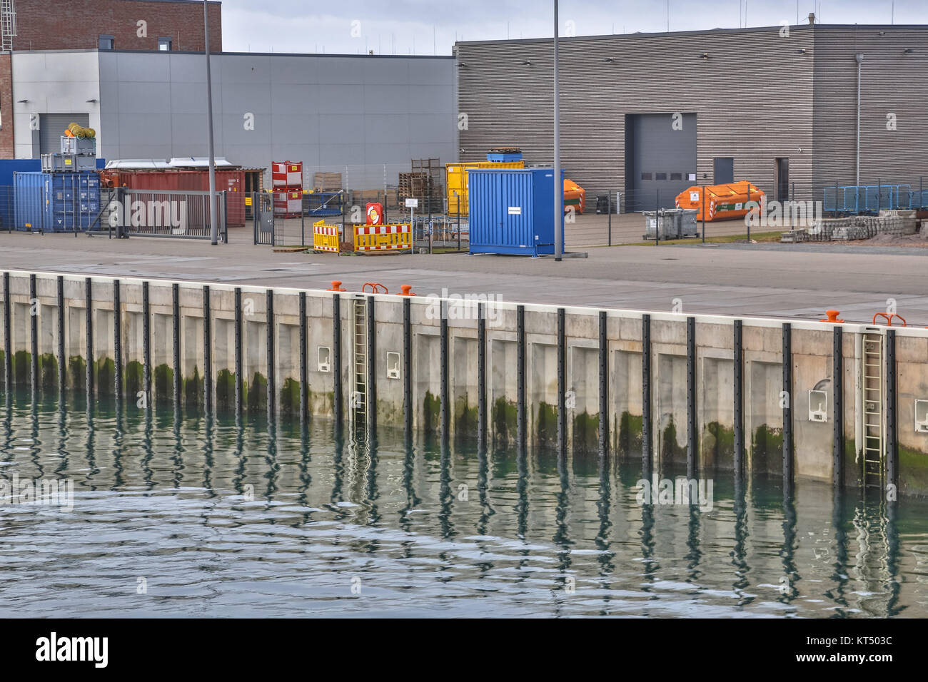 Detail of small industrial harbor with equipment and new modern quay ...