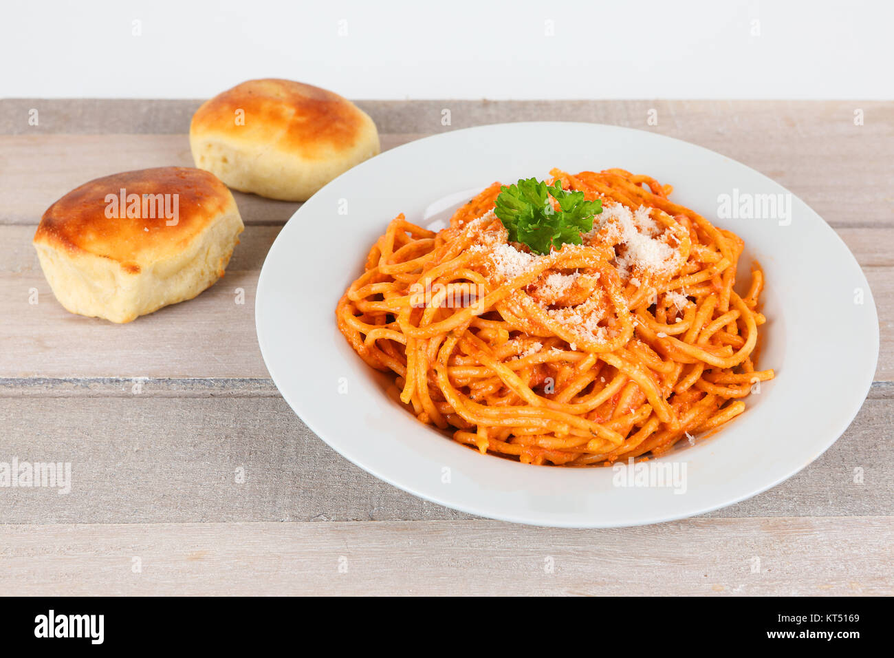 Spaghetti Napoli with pizza rolls Stock Photo - Alamy