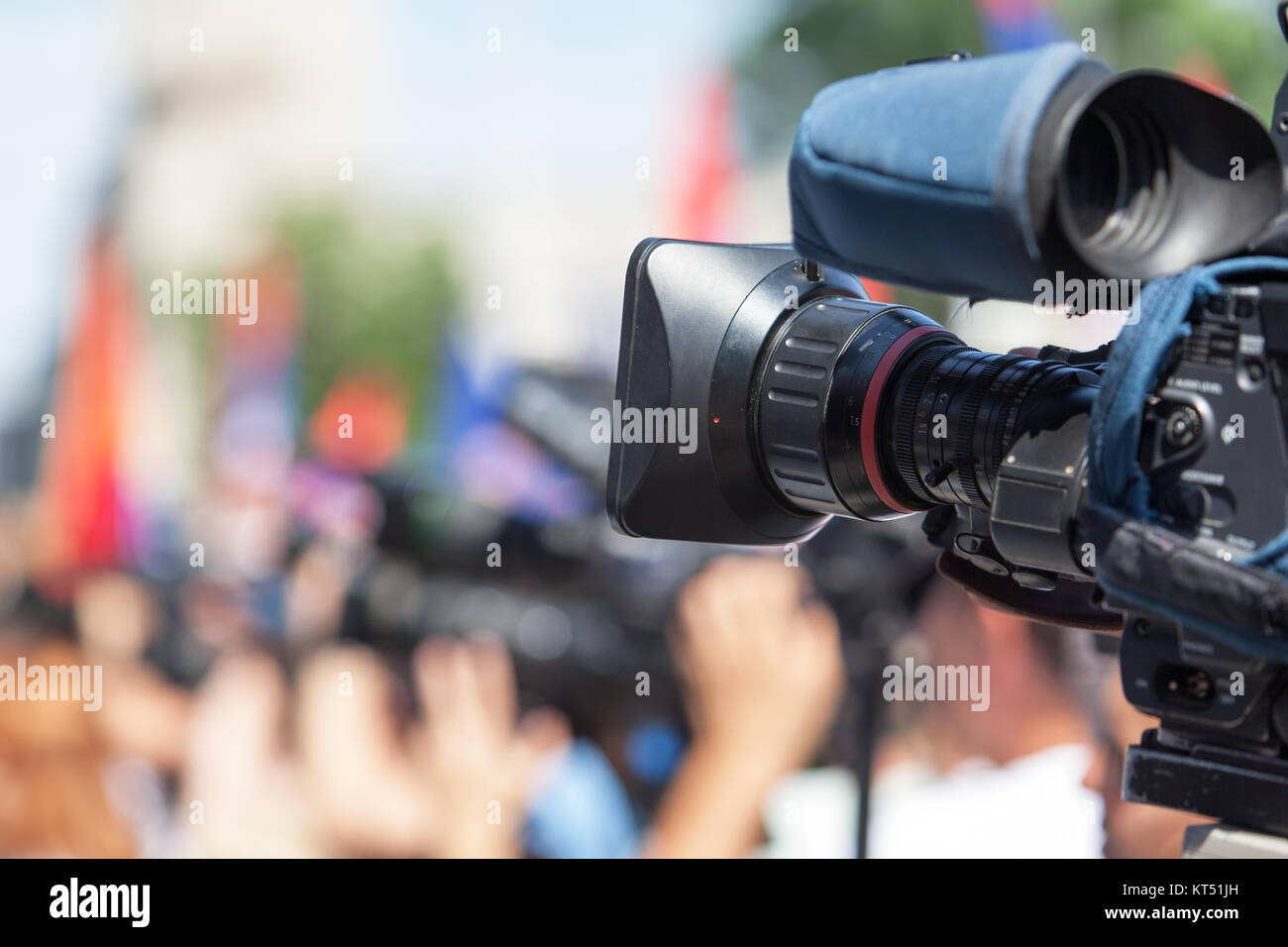 Filming an event with a video camera Stock Photo - Alamy