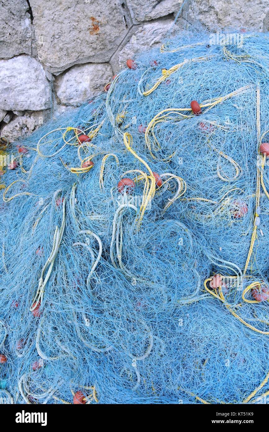 blue fishing nets Stock Photo - Alamy
