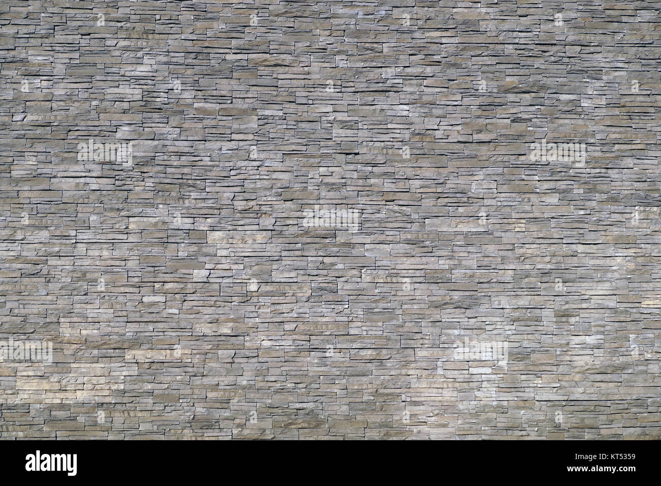Brick wall with small blocks for background Stock Photo - Alamy