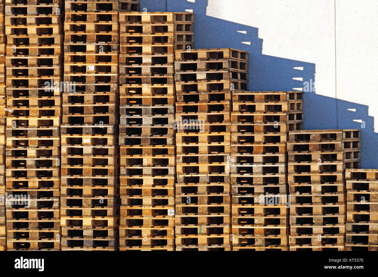wooden pallet overlap in warehouse . Transport platform Stock Photo - Alamy