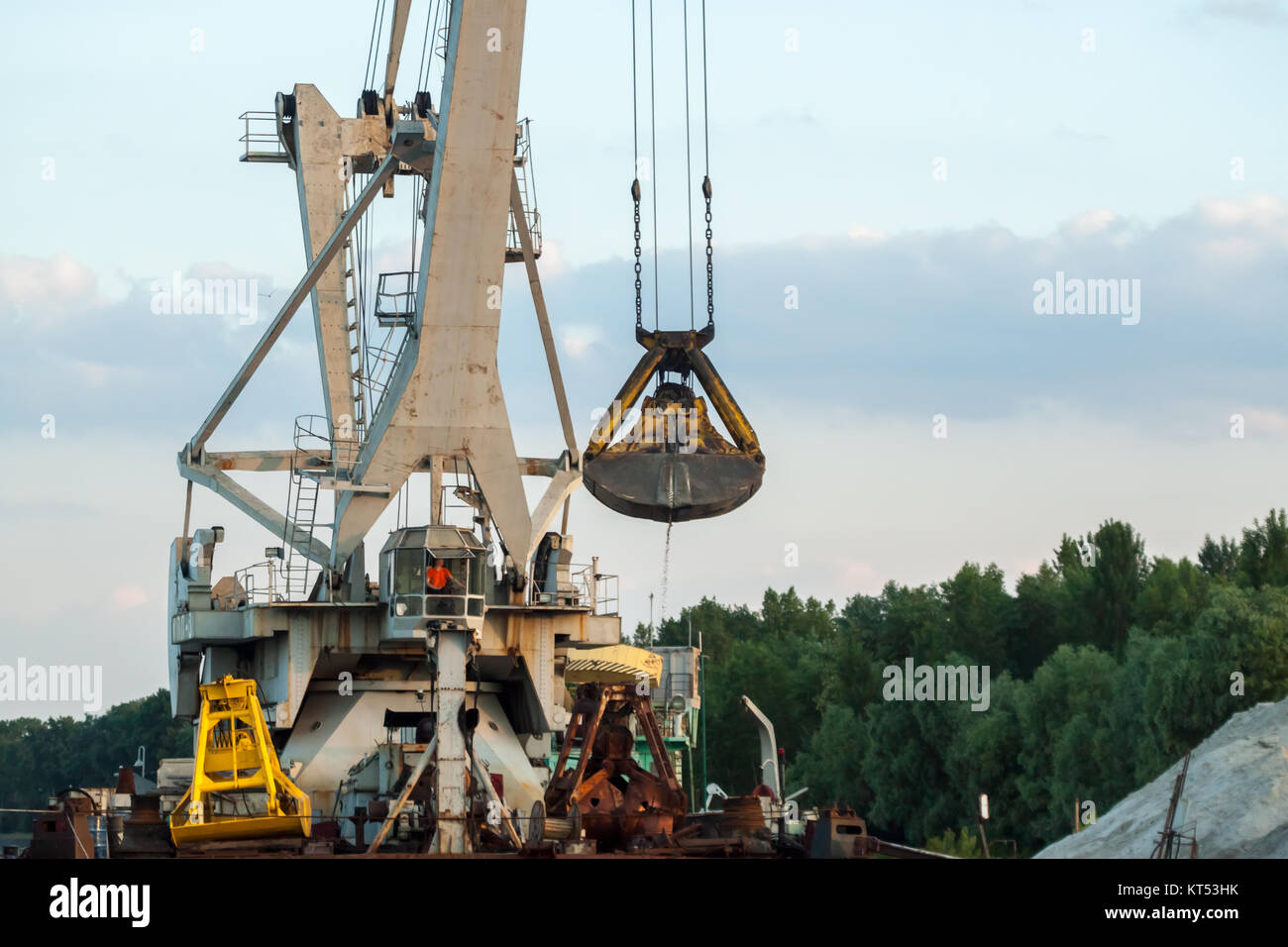 small crane working in bay Stock Photo - Alamy