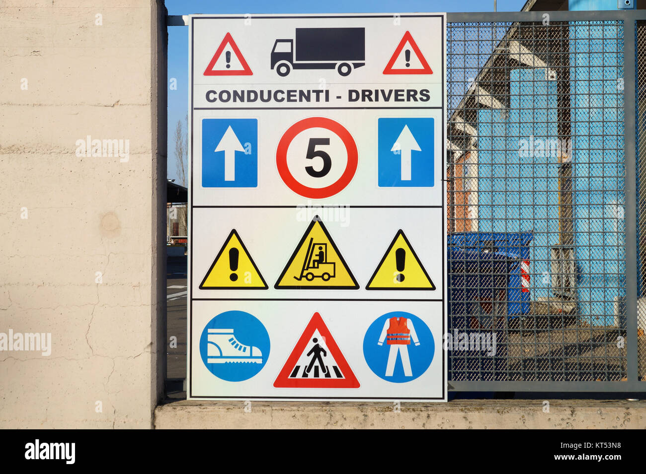 construction site sign with safety notices hanging on a wall Stock ...