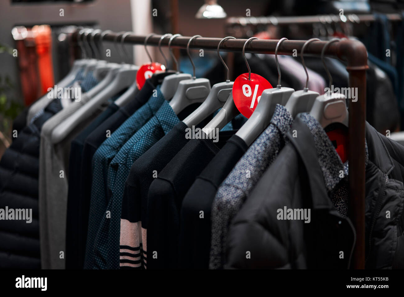 clothes on hangers in the store Stock Photo - Alamy