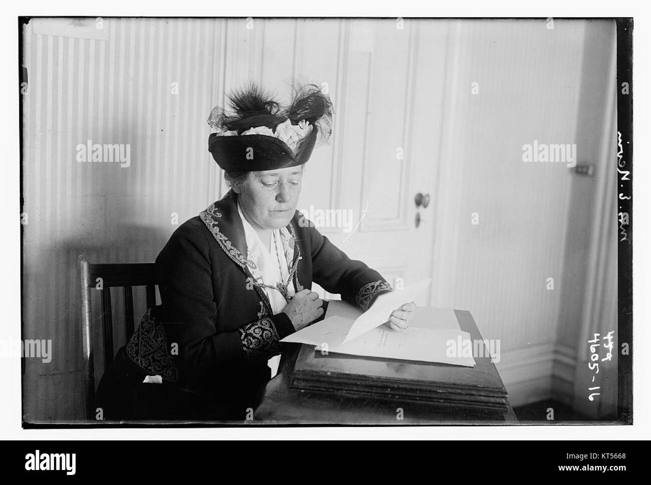This photograph likely portrays a portrait of Mrs. E. Nevin, a ...