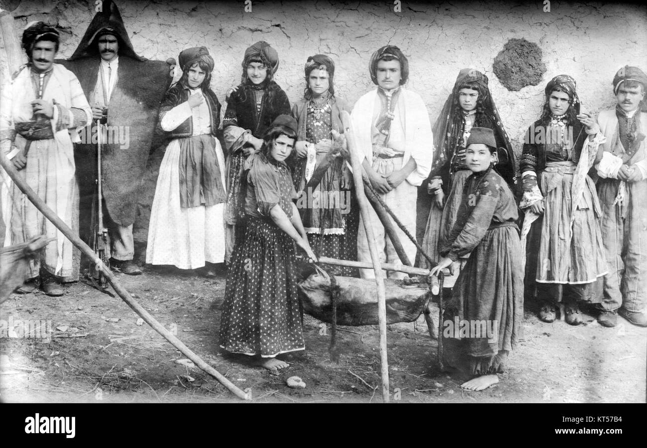 Nestorian (Assyrian) Christian family making butter, Mawana, Persia ...