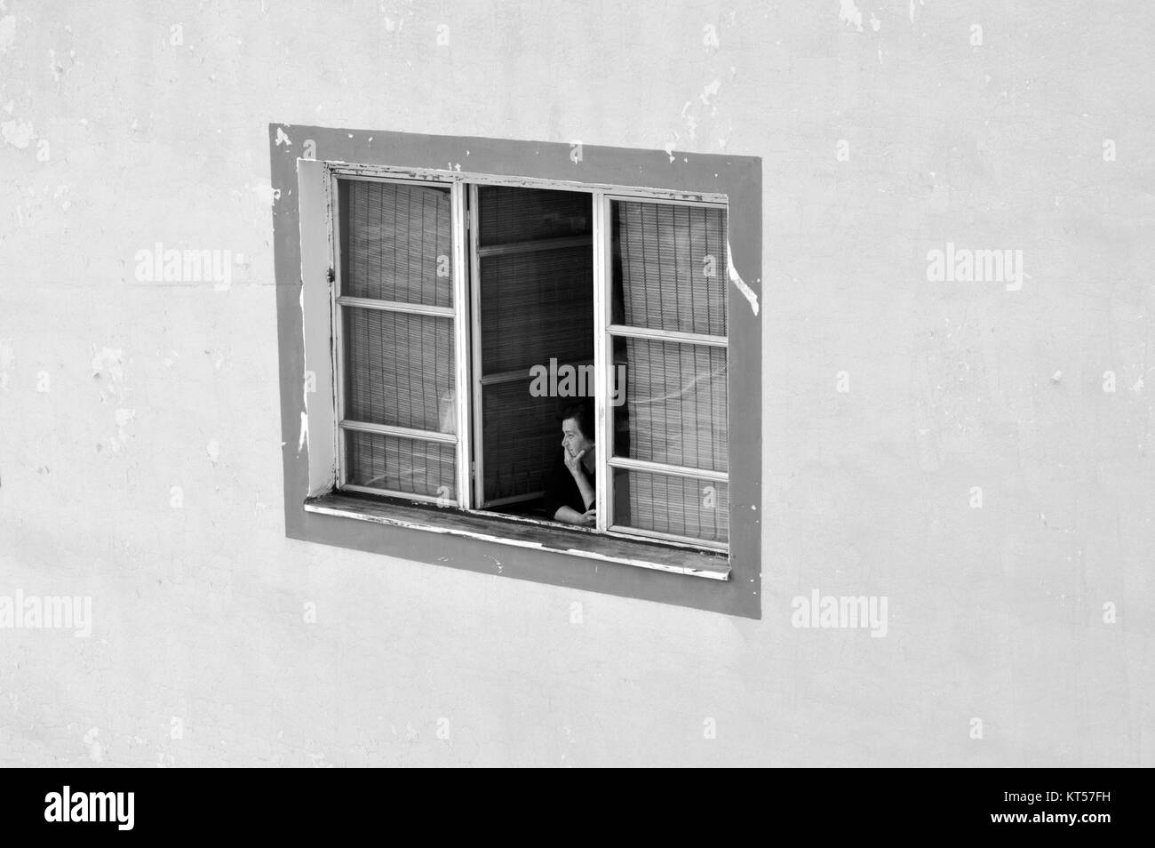 woman on the window Stock Photo - Alamy