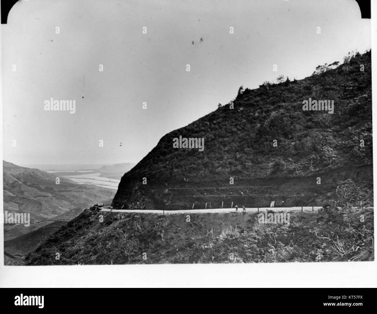 This photograph captures the New Pali Road in Hawaii, showcasing the ...