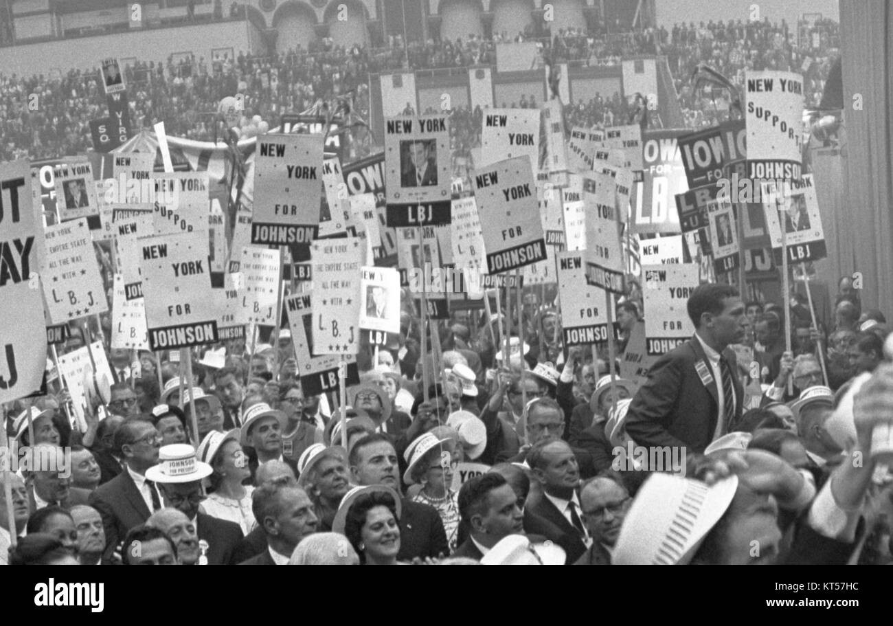 Delegates from New York and Iowa are seen on the floor during the 1964 ...