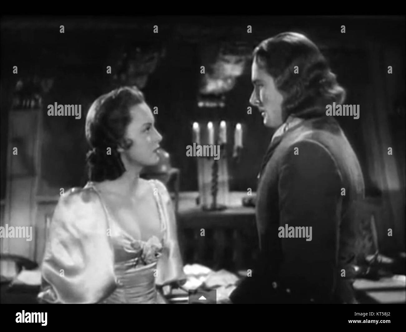 Olivia de Havilland and Errol Flynn in Captain Blood trailer Stock Photo - Alamy