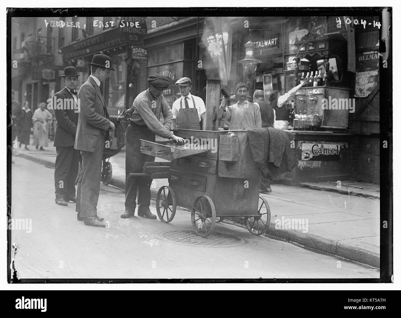 A photograph of a peddler on the East Side, capturing the essence of ...