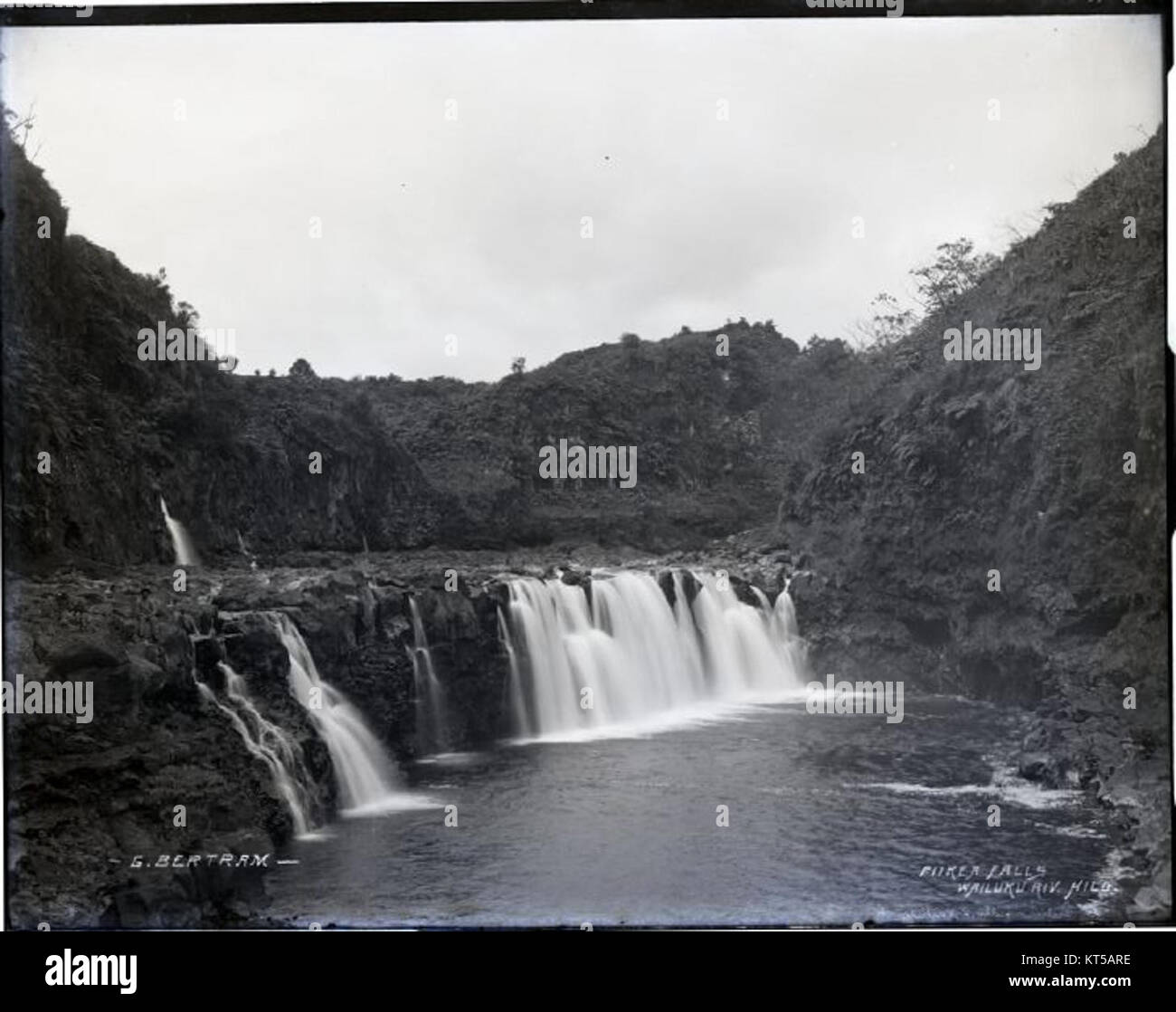 Piikea Falls, located along the Wailuku River in Hawaii, is captured in ...