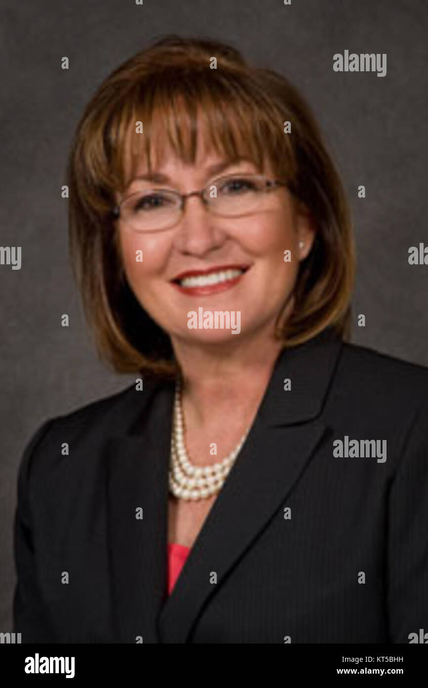 A portrait of Teresa Jacobs, a significant figure, showcasing her in a ...