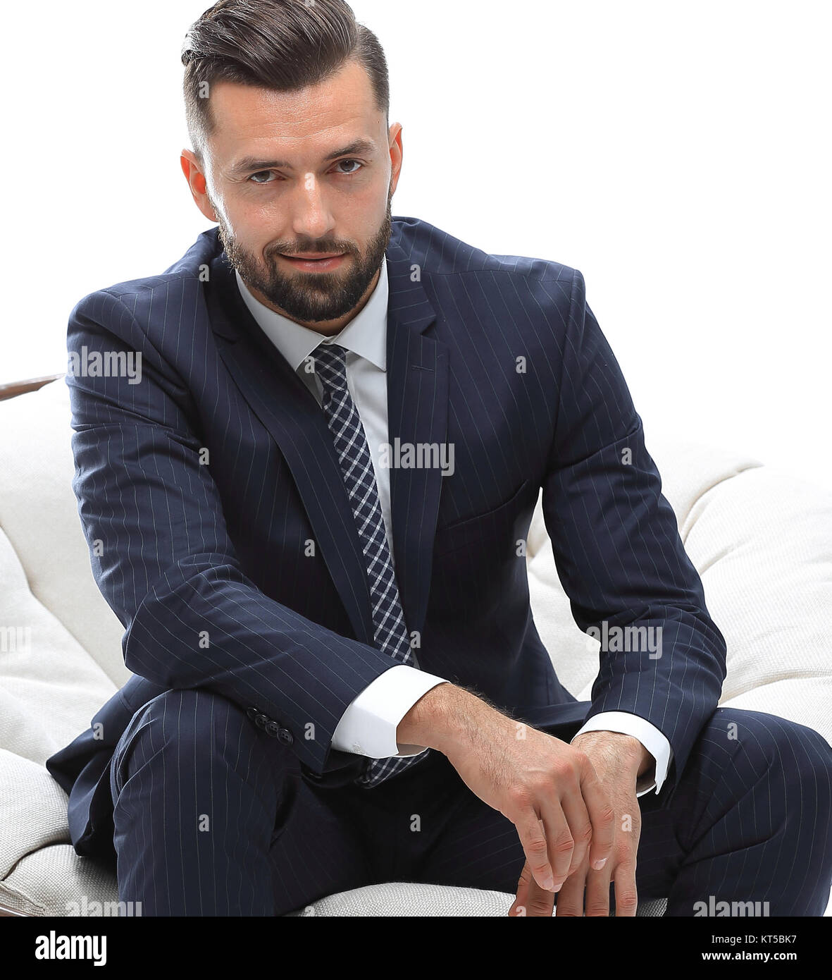 businessman sitting in a comfortable chair Stock Photo - Alamy