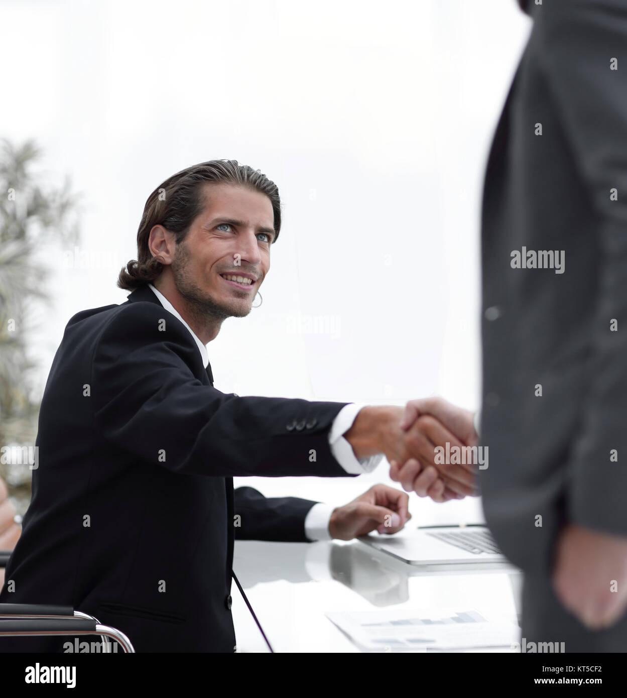 handshake colleagues in the office Stock Photo - Alamy