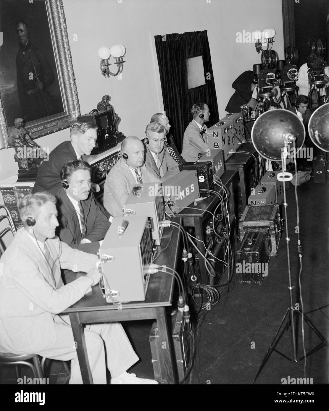This 1939 image refers to the radio press fireside chat, a common media ...