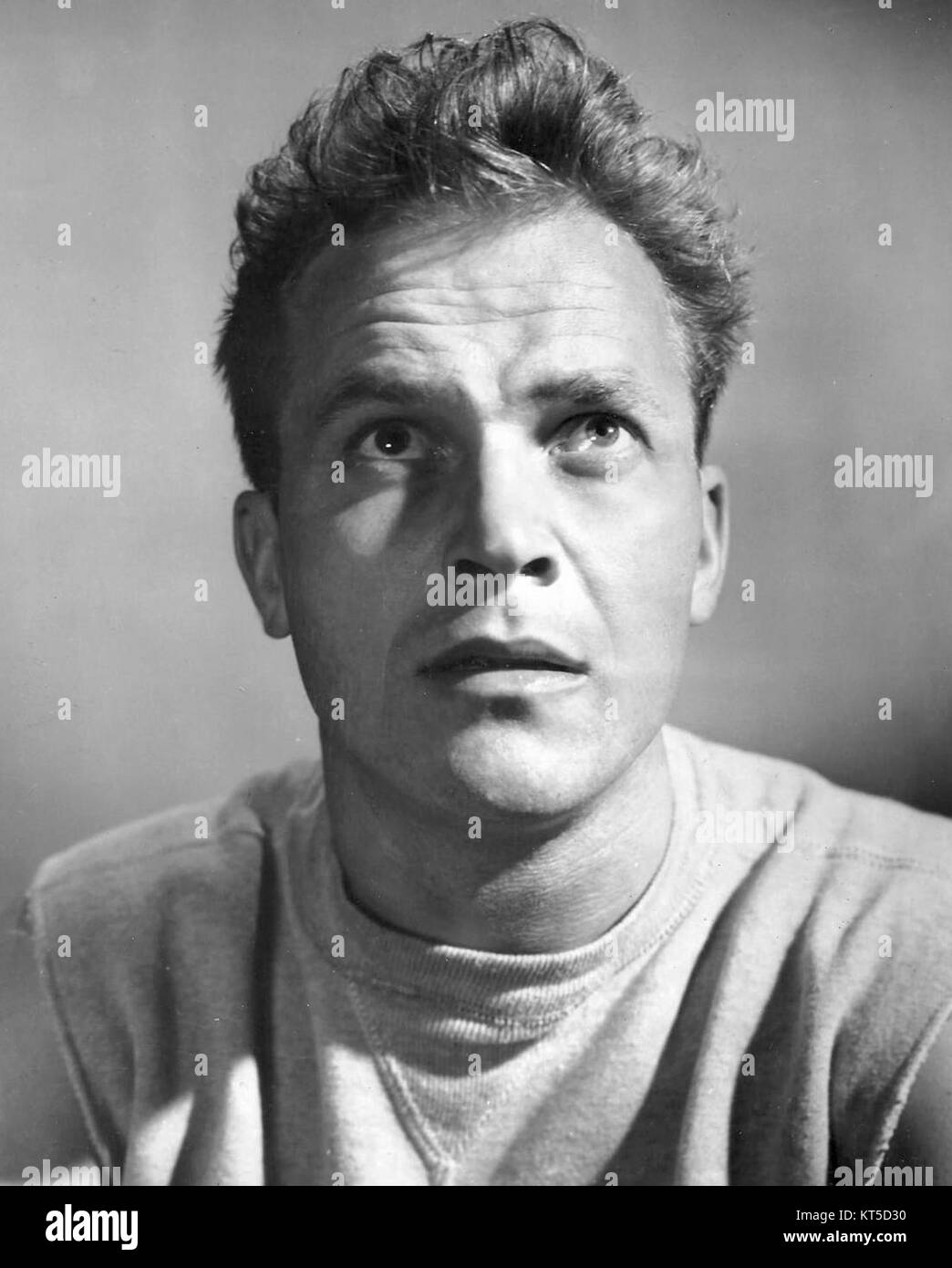 Ralph Meeker, an American actor, is captured in a 1952 publicity ...