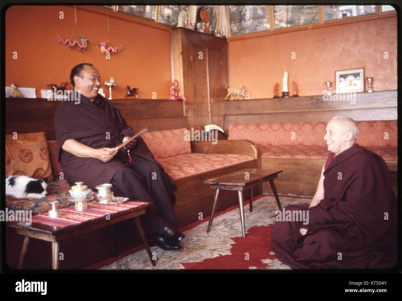 Rangjung Rigpe Dorje, the 16th Karmapa, is depicted seated with a monk ...