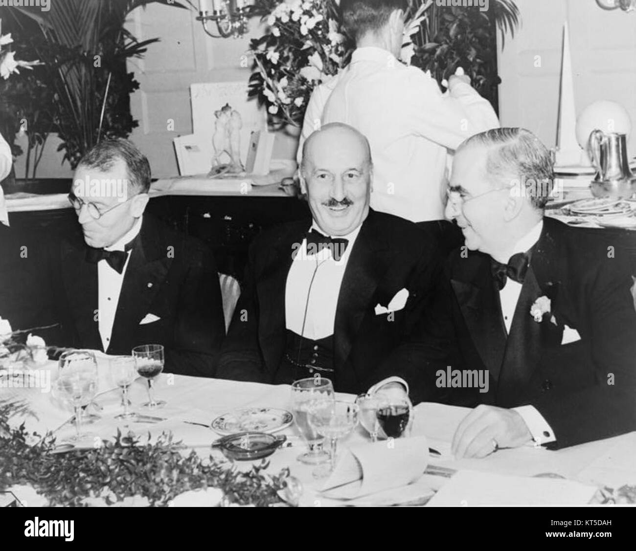 This historical photograph features Rear Admiral Emory S. Land, J ...
