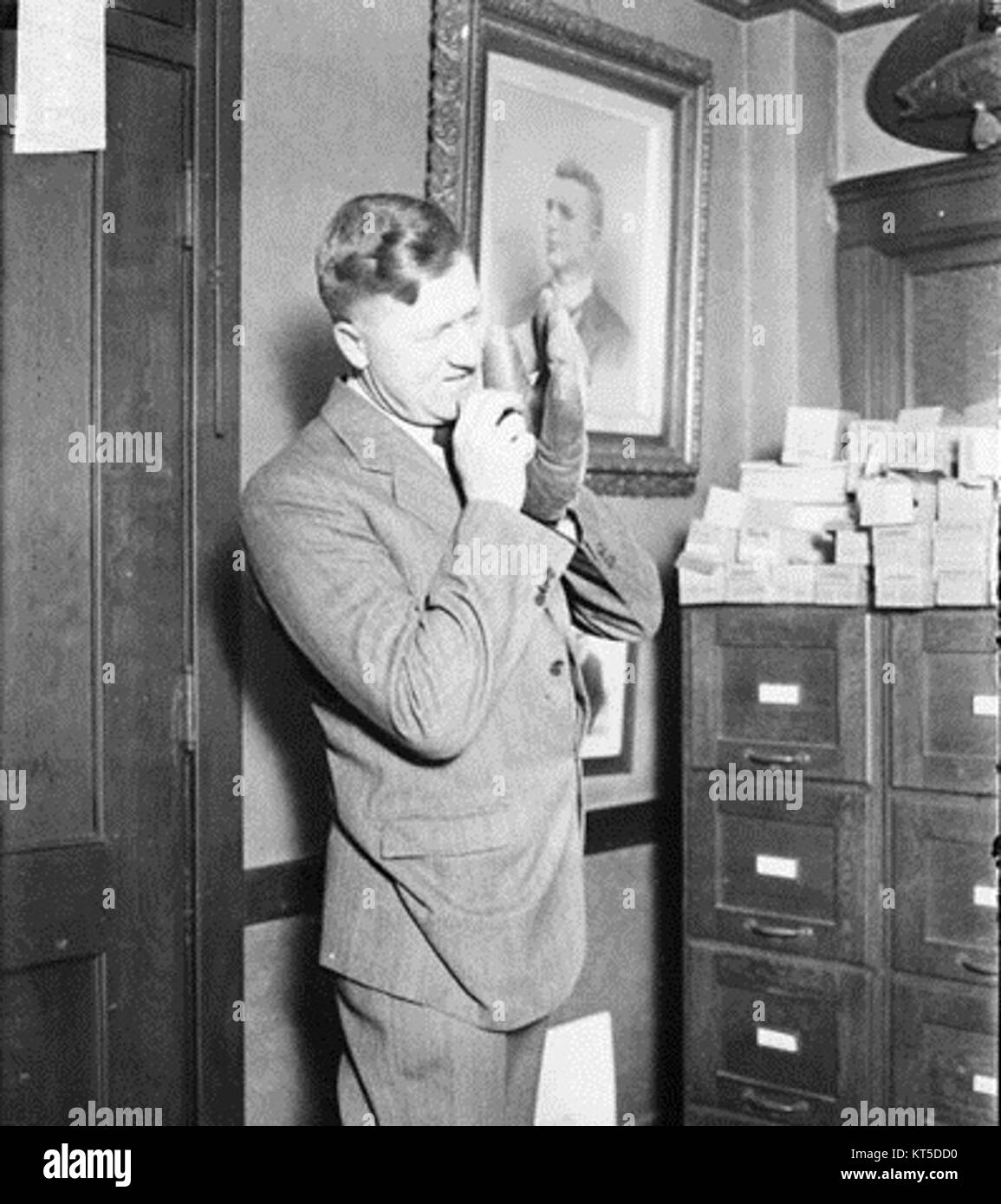 Red Faber, a notable baseball player, is pictured in a suit in this ...