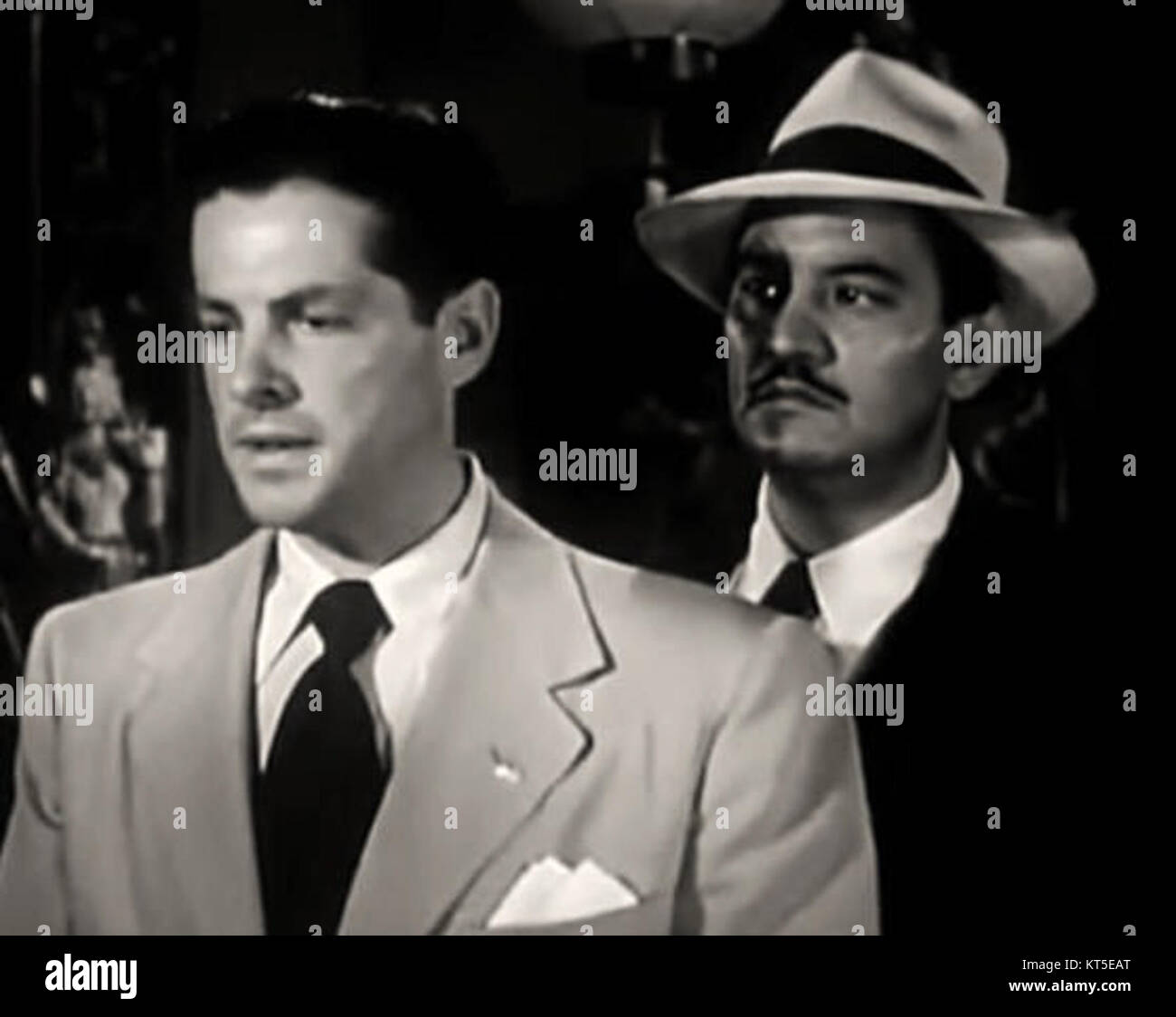 This image features Robert Cummings and Alex Montoya in a scene from ...