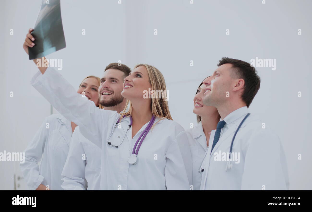 Team of medical professionals working at the medical office Stock Photo ...