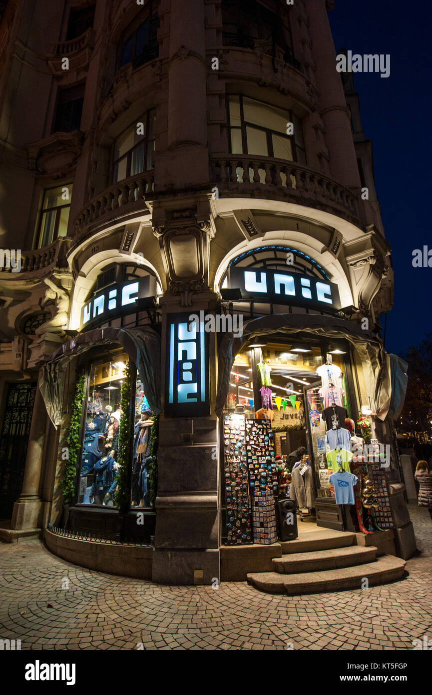 A small souvenir and garment store in downtown Porto, Portugal Stock ...