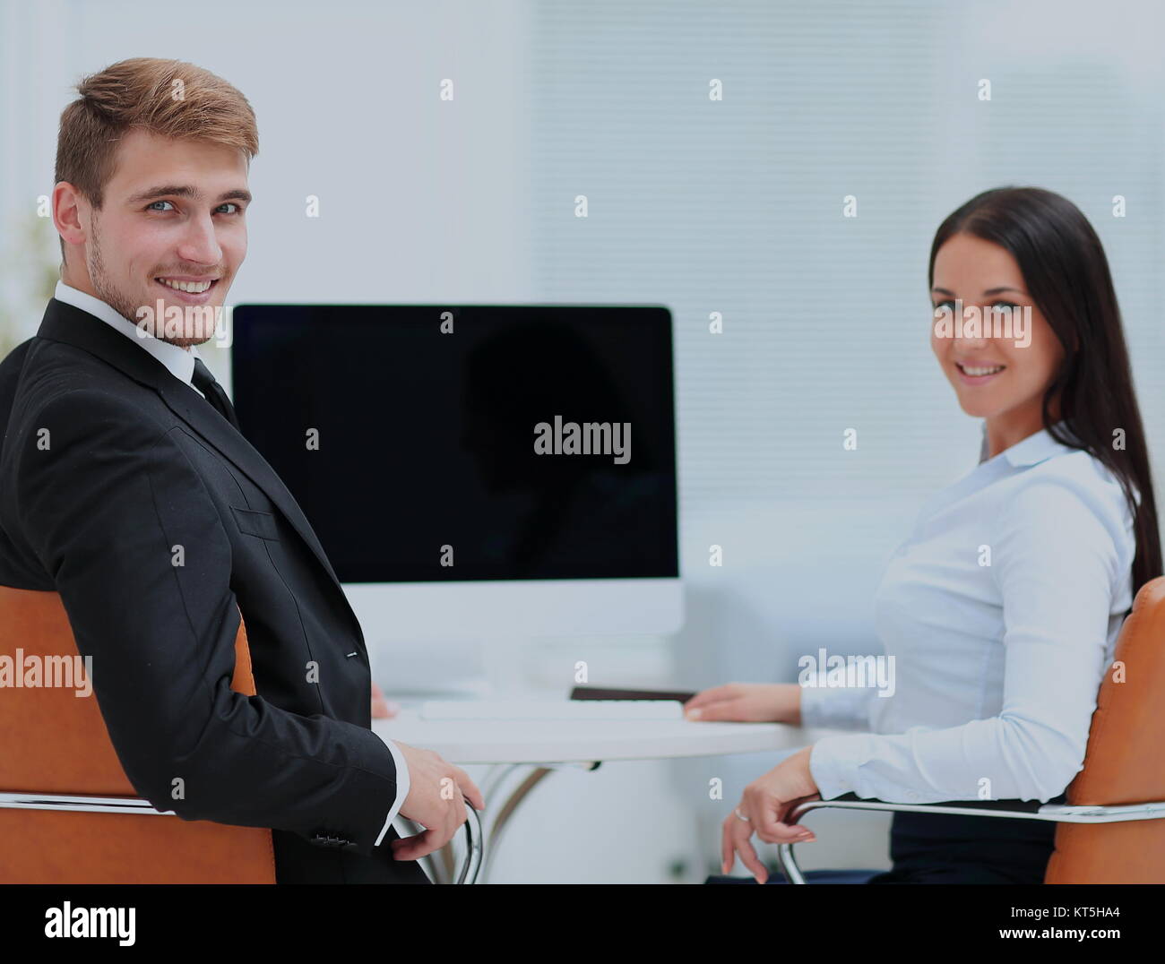 Business meeting at the table with computer Stock Photo - Alamy