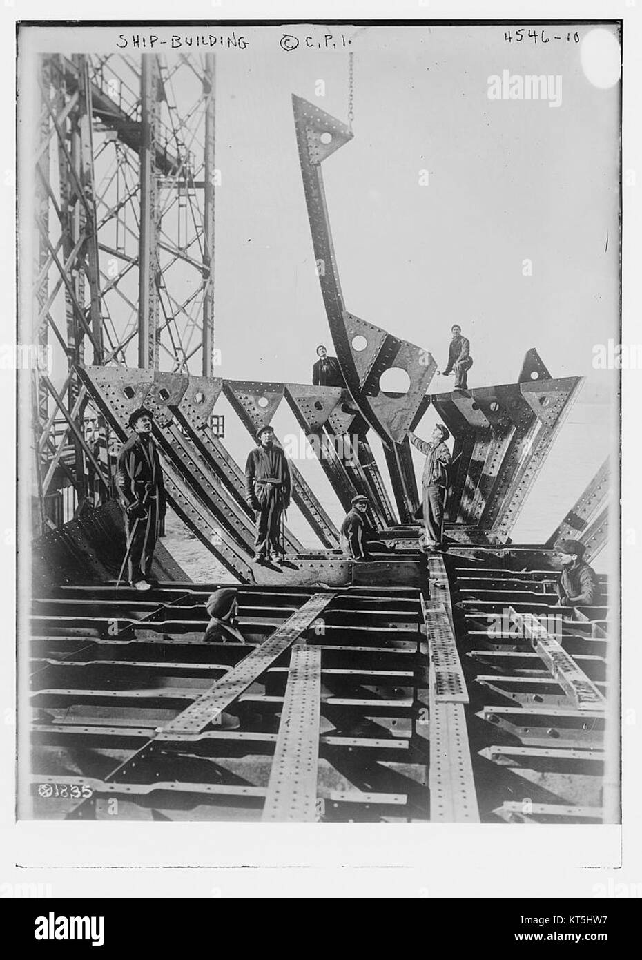 This image illustrates the process of shipbuilding, with workers ...