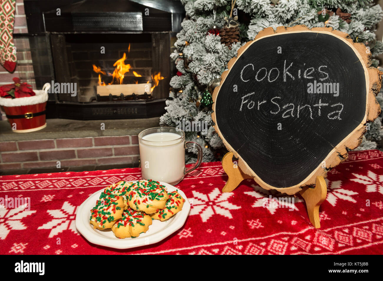 Cookies and milk by the fireplace for Santa on Christmas Eve Stock ...