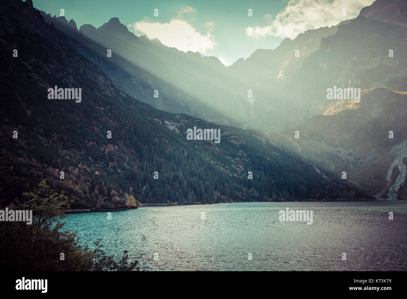 Green water mountain lake Morskie Oko, Tatra Mountains, Poland Stock ...