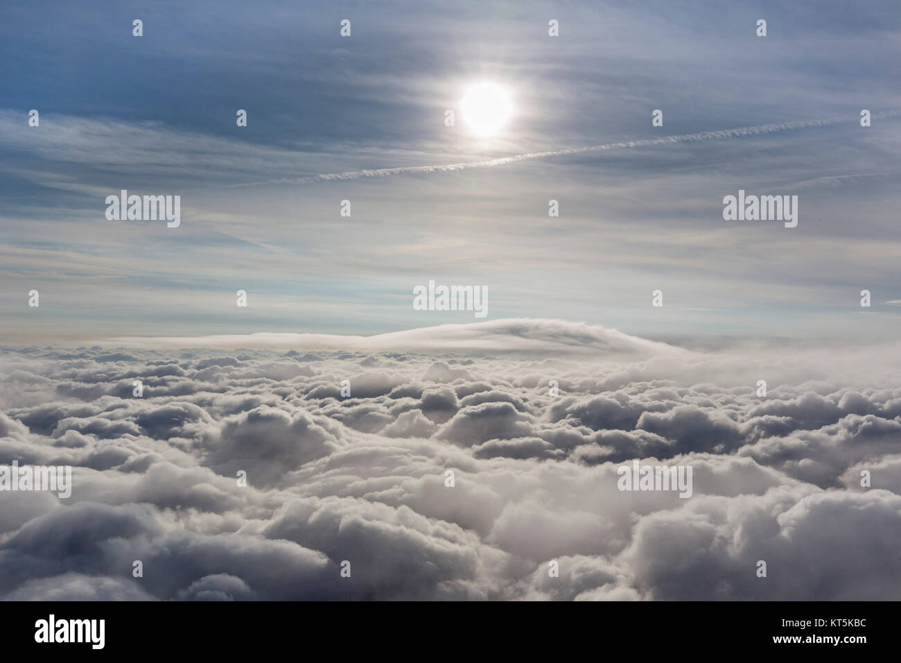 Lenticular cloud above the uppermost cloud layer, cumulus lenticularis ...