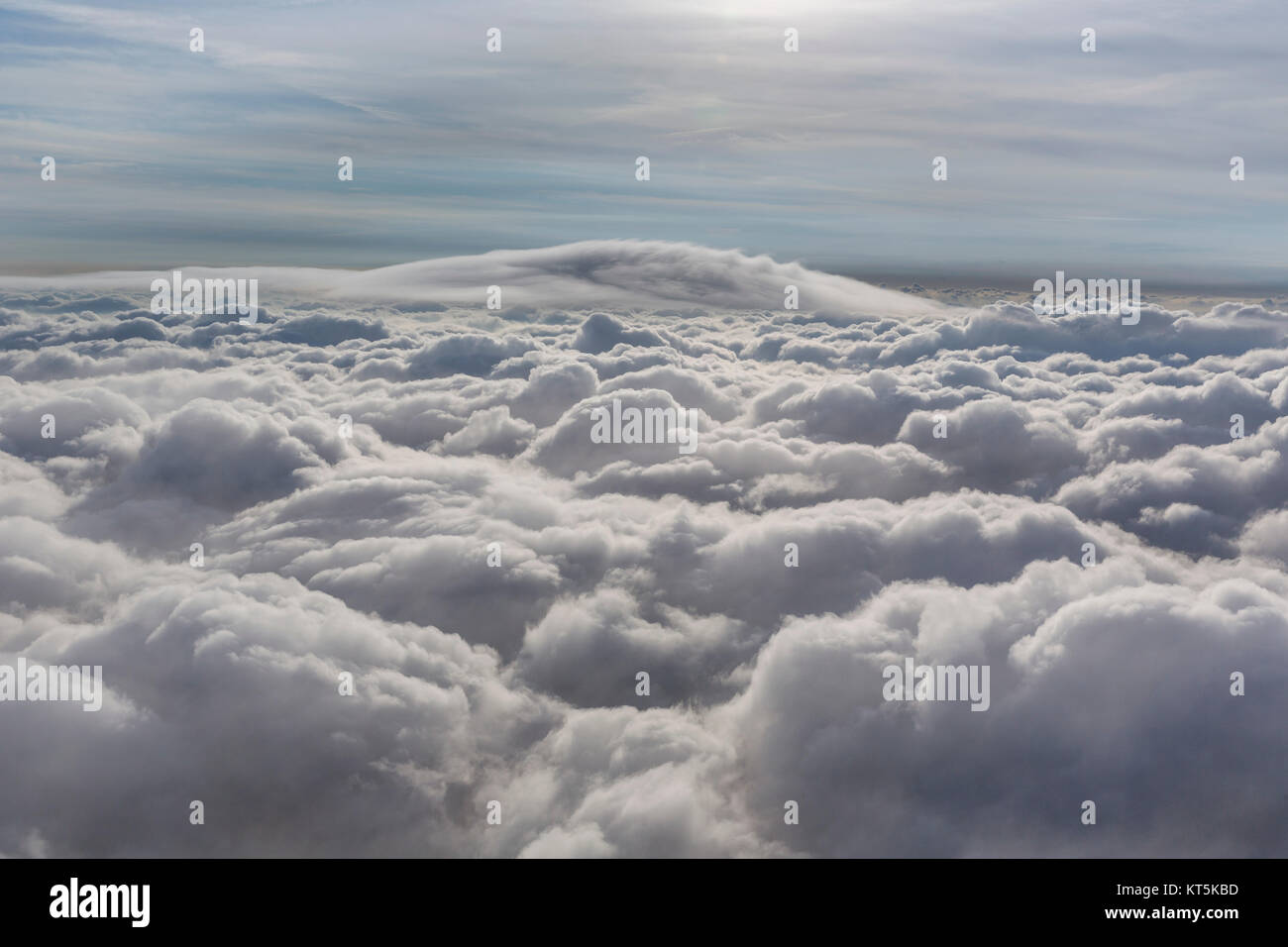 Lenticular cloud above the uppermost cloud layer, cumulus lenticularis ...