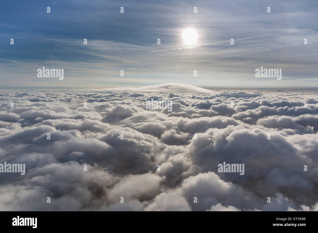 Lenticular cloud above the uppermost cloud layer, cumulus lenticularis ...
