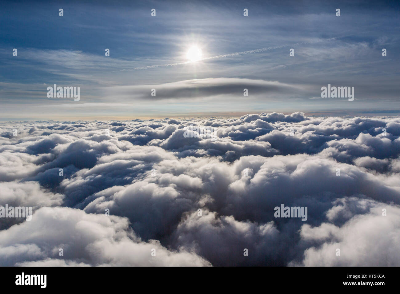 Lenticular cloud above the uppermost cloud layer, cumulus lenticularis ...