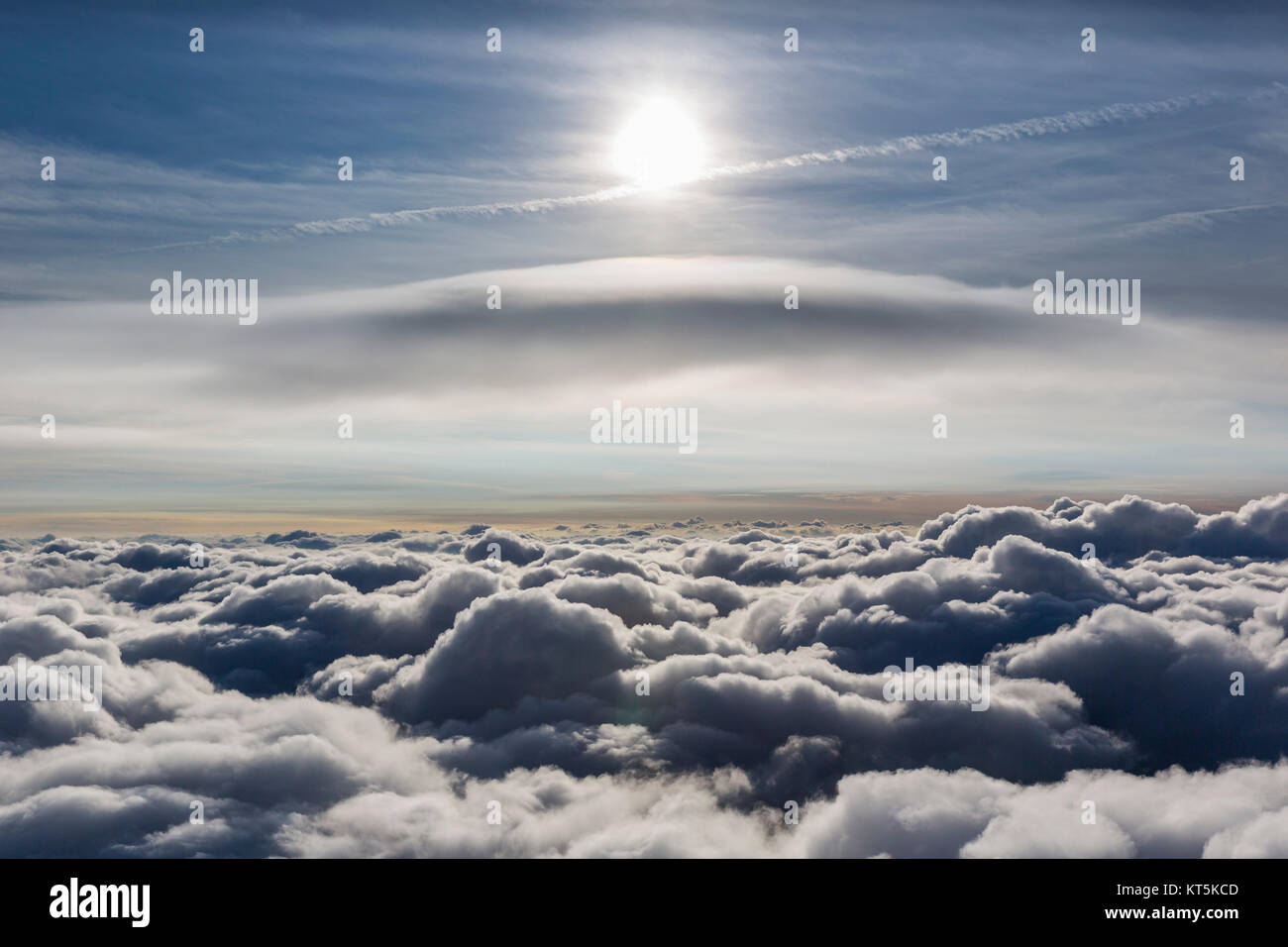 Lenticular cloud above the uppermost cloud layer, cumulus lenticularis ...