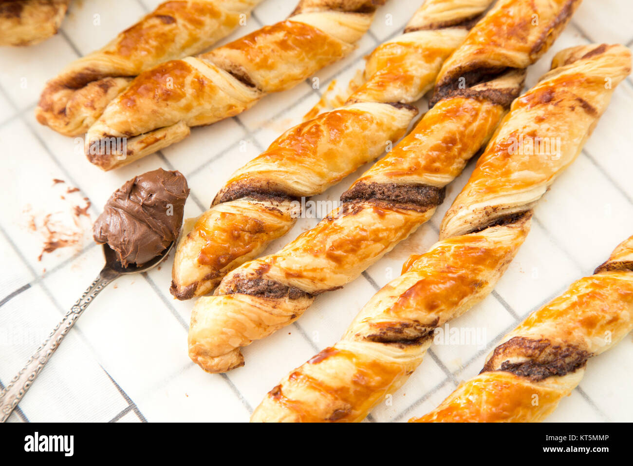 homemade cakes - puff pastry with chocolate paste. twisted cakes with ...