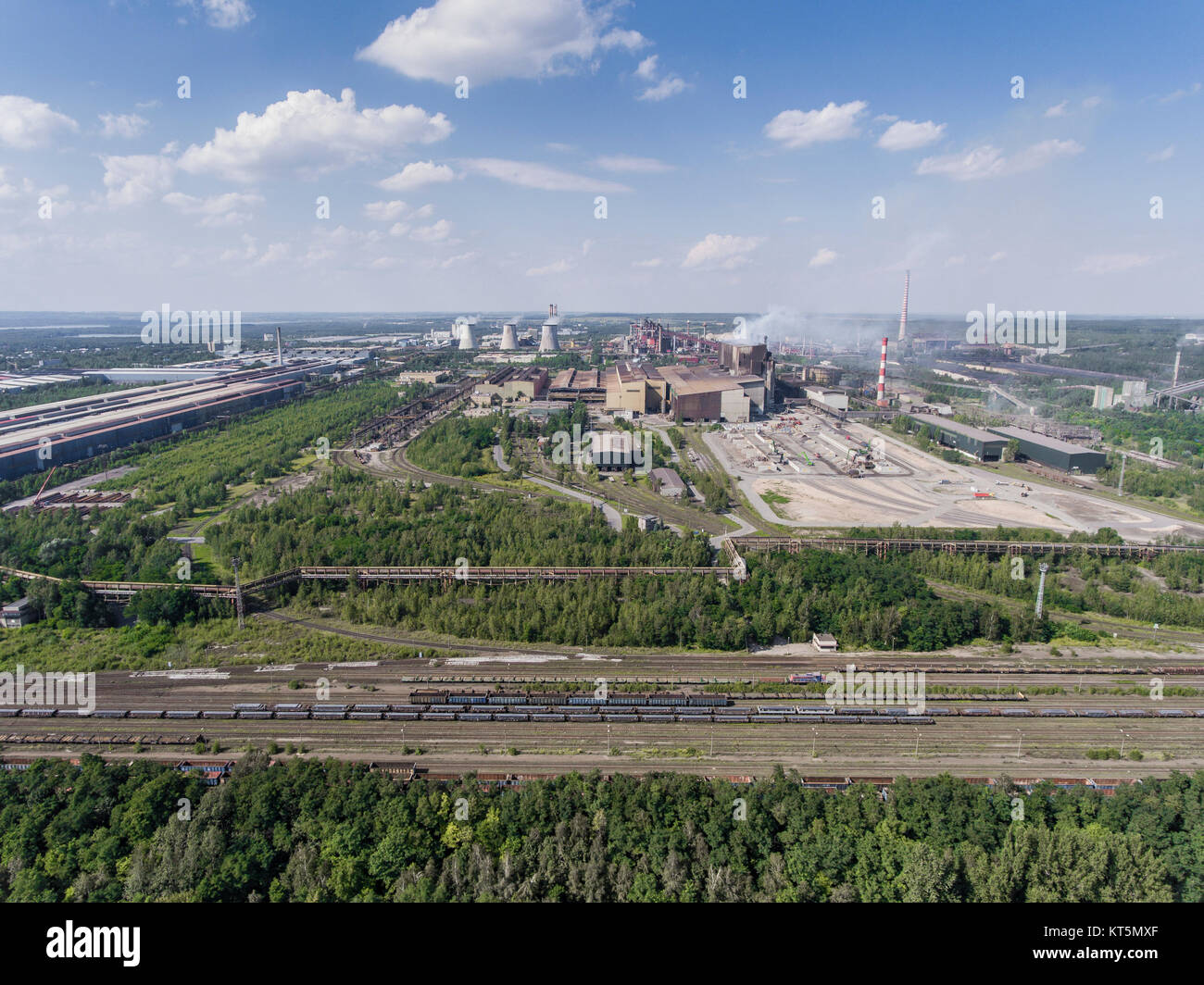 Steel factory with smokestacks at sunny day.Metallurgical plant ...