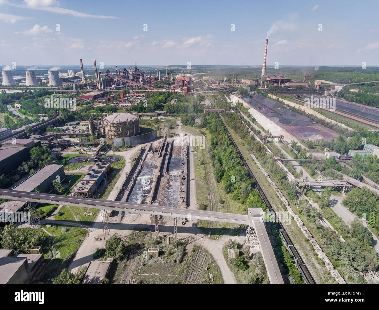 Steel factory with smokestacks at sunny day.Metallurgical plant ...