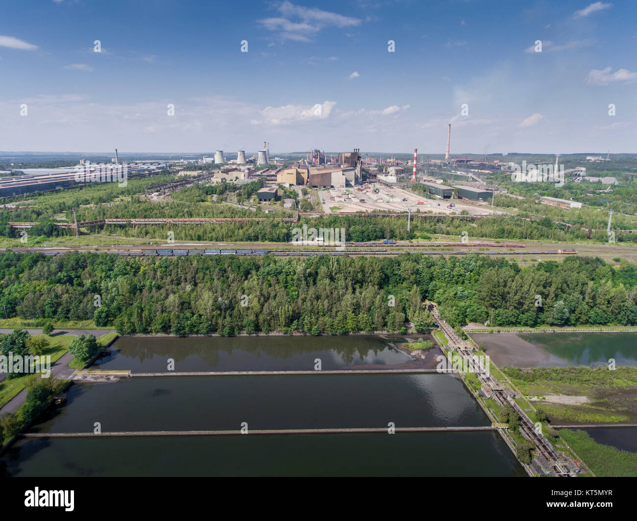Steel factory with smokestacks at sunny day.Metallurgical plant ...