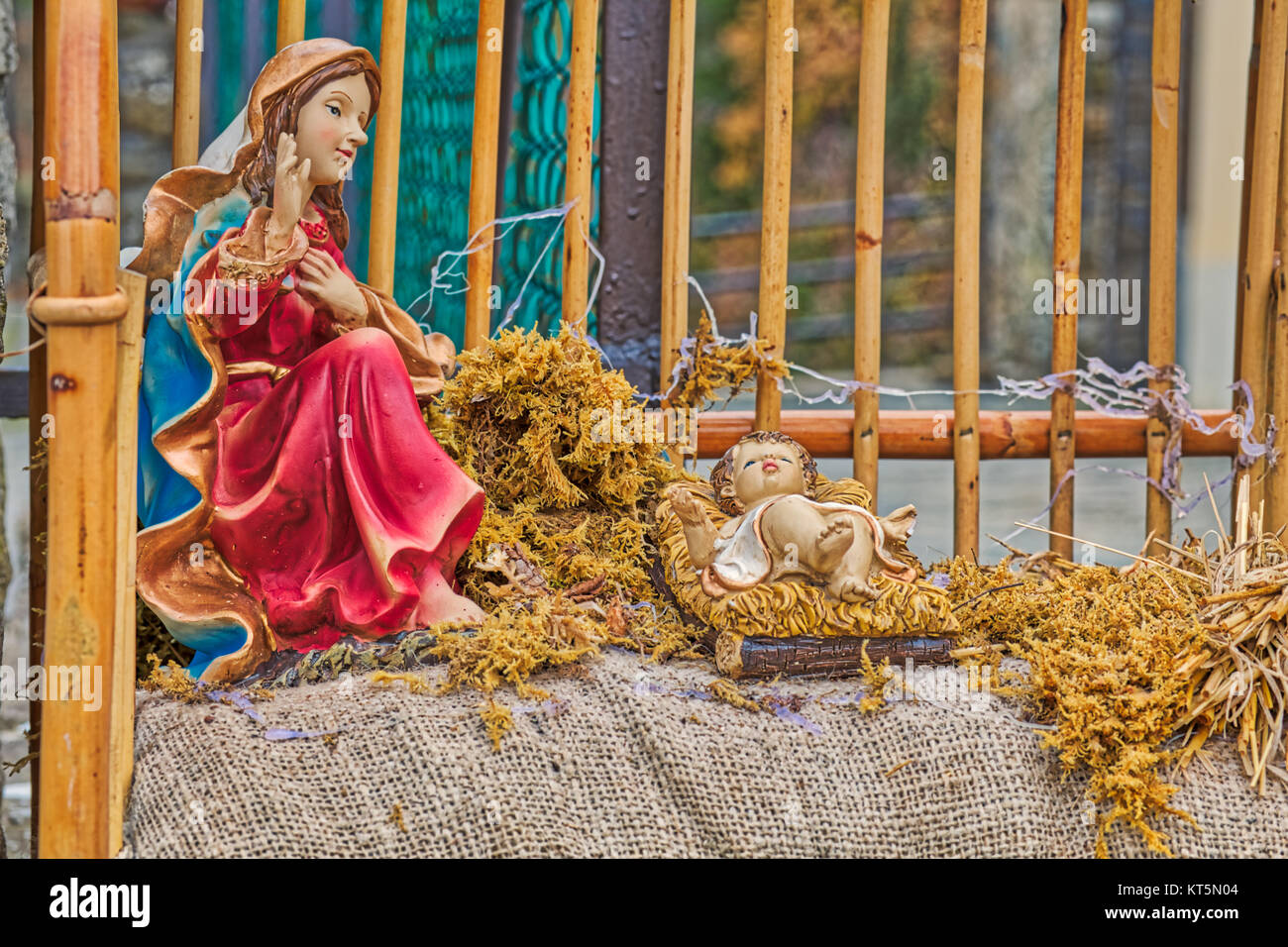 The Blessed Virgin Mary and Baby Jesus in manger in Christmas Nativity ...