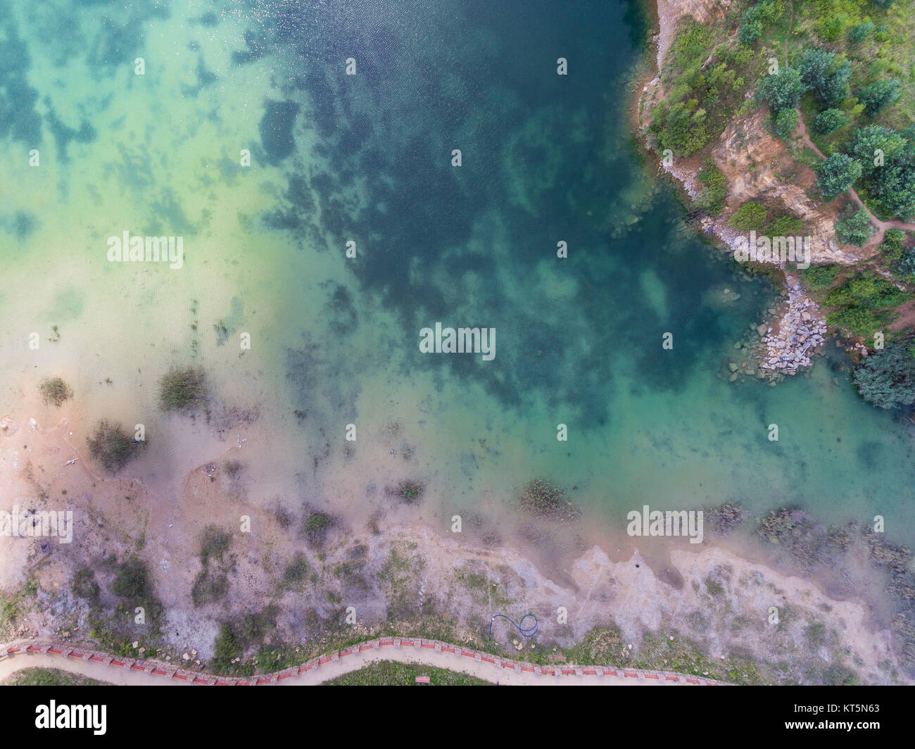 Blue laggon see from above in old sand mine in Poland Stock Photo - Alamy