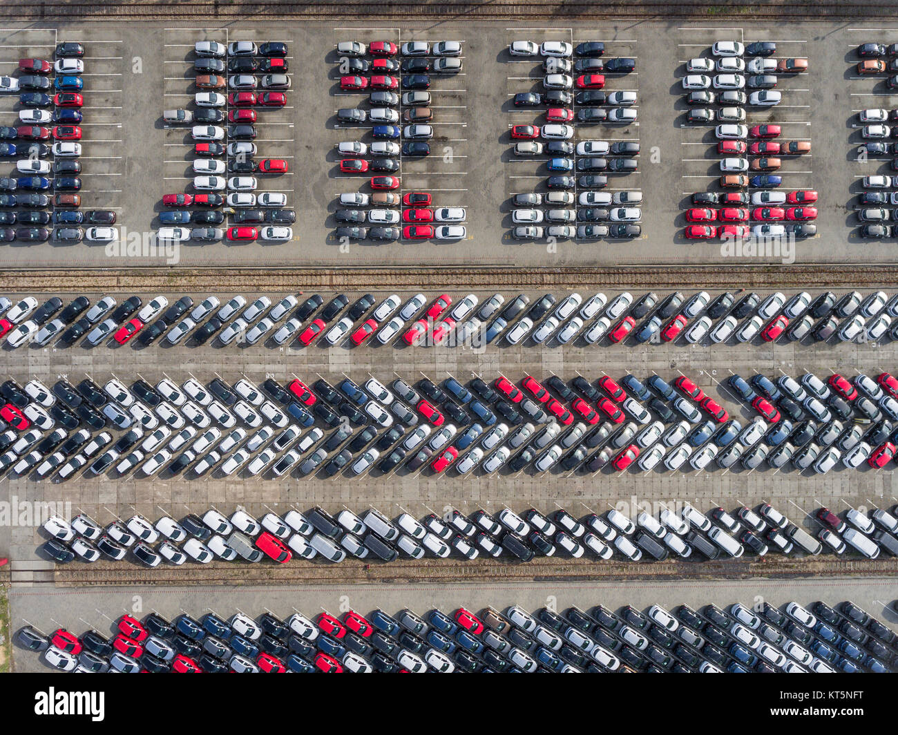 Aerial view lot of vehicles on parking for new car Stock Photo - Alamy