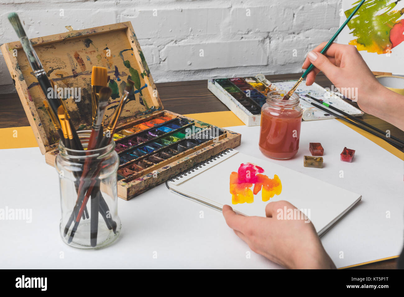 partial view of artist painting abstract picture at workplace Stock ...