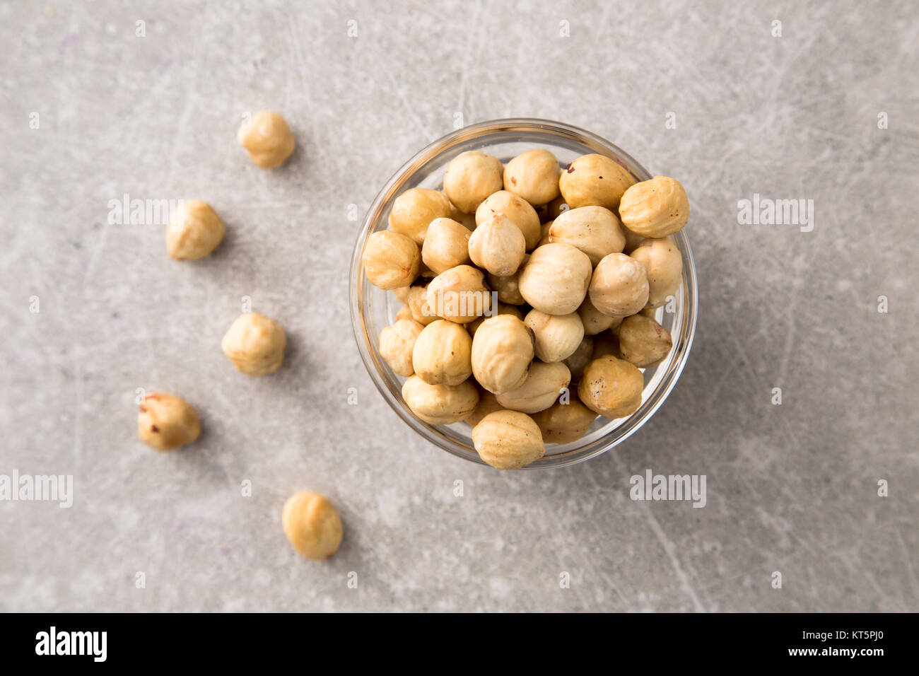 roasted hazelnut in the glass bowl on stone table Stock Photo - Alamy