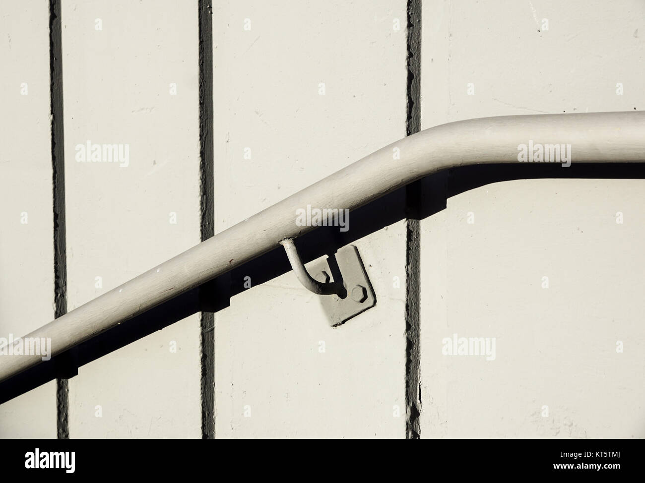 Holder handrail railing stainless steel Close up detail Stock Photo - Alamy